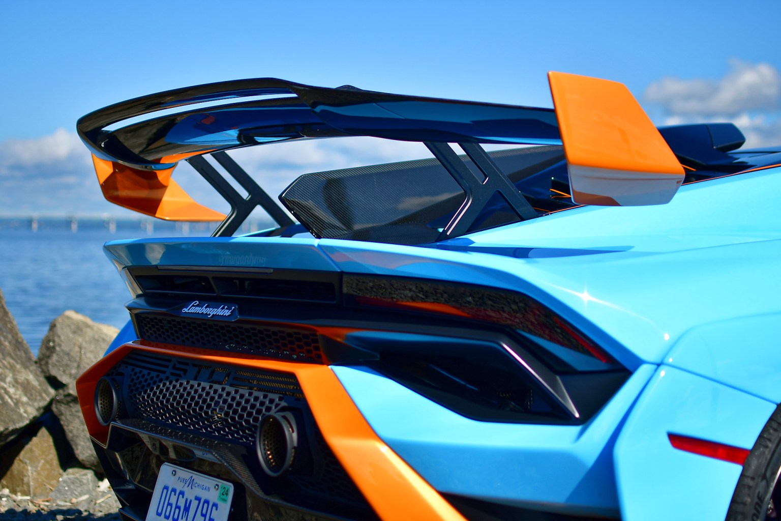 Lining up Lamborghini’s Huracán STO with Aston Martin’s DBS - COOL HUNTING®